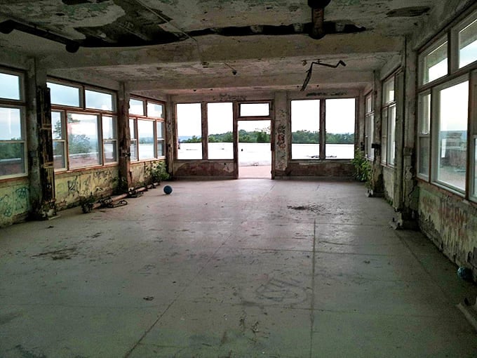 Empty rooms with endless windows once housed patients seeking fresh air therapy that rarely delivered promised cures.