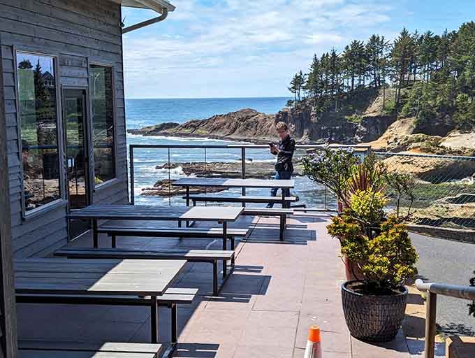 The outdoor patio where brave souls dine al fresco, trading climate control for unfiltered ocean breezes and unobstructed whale watching.
