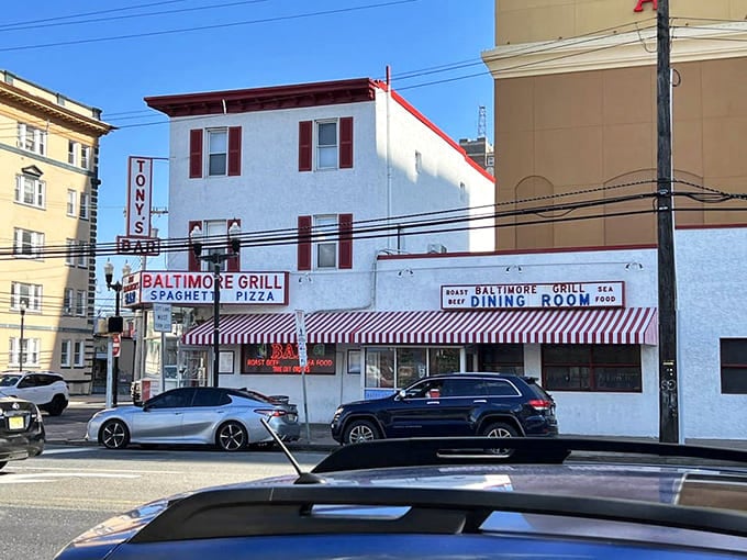 The striped awning and classic signage stand proud on Atlantic Avenue, impossible to miss or forget.