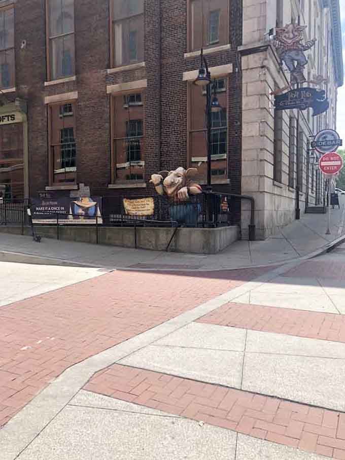 The troll keeps watch from his perch, welcoming visitors to Louisville's most wonderfully weird underground dining spot.