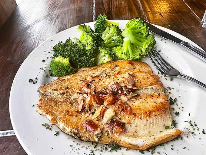 Trout almondine that proves sometimes the classics endure for good reason&mdash;perfectly cooked fish, nutty crunch, and a side of vibrant broccoli for color and conscience.