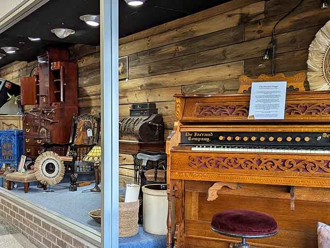 Marion's Vintage Market window display showcases treasures from yesteryear. One person's nostalgia is another's perfect living room conversation piece.