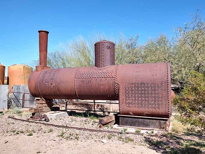 This riveted steam boiler powered dreams of fortune, now resting quietly among the desert brush and memories.