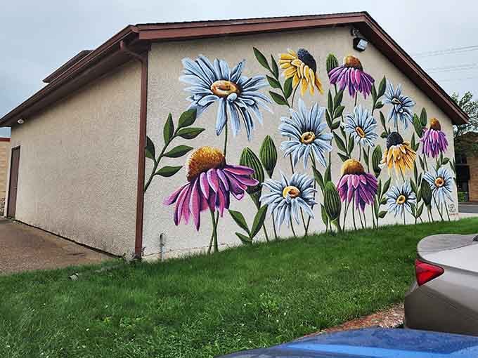 A cheerful floral mural brightens the exterior, adding unexpected whimsy to this already delightful Shakopee landmark destination.