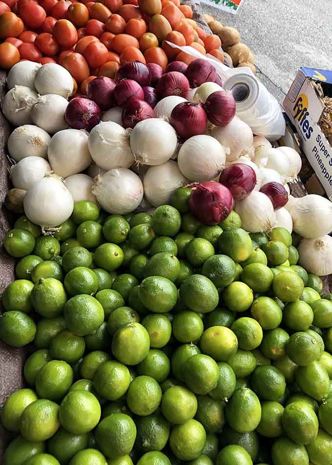 Fresh limes, onions, and tomatoes create a rainbow of produce that would make any home cook weep with joy.