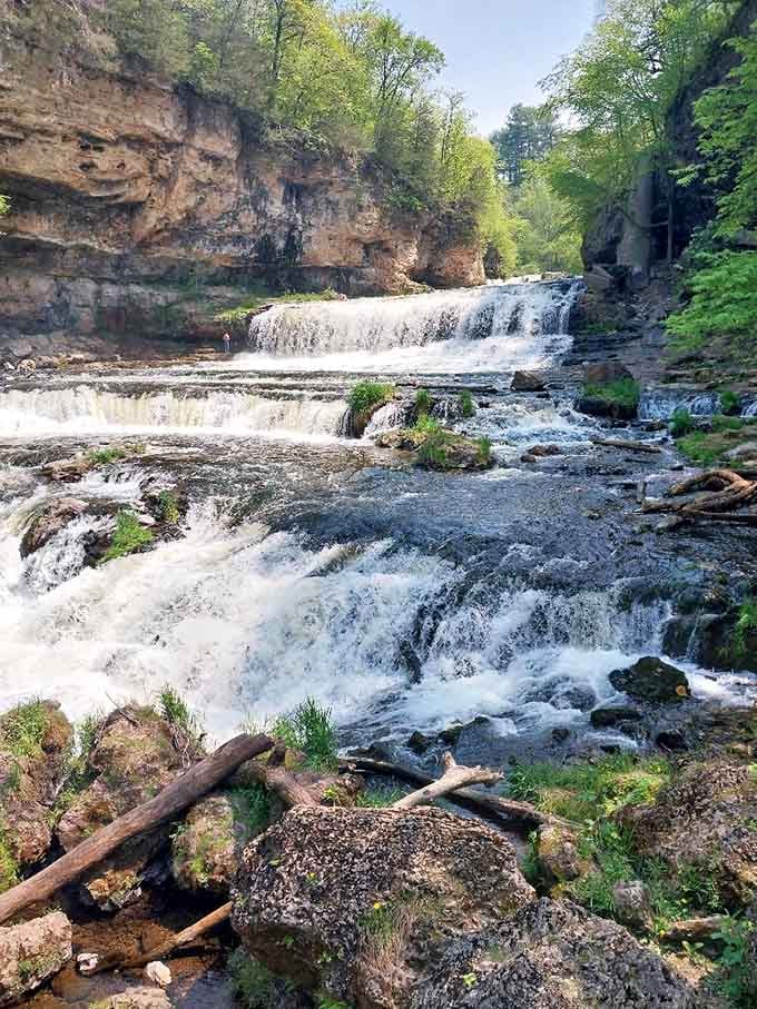 These cascading falls tumble over ancient rock like they've been practicing this routine for centuries.