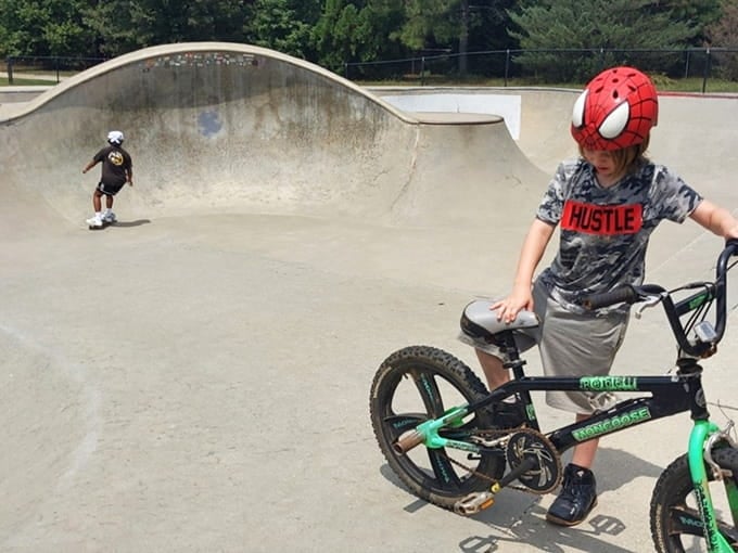 A skate park sits nearby for older kids who've graduated from slides to kickflips and ollies.