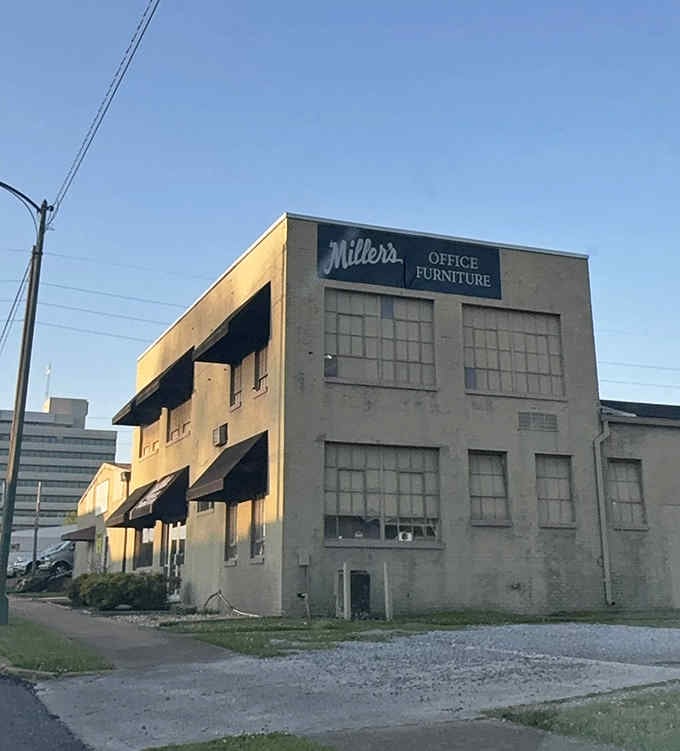 Miller's Office Furniture building stands proudly behind their creation, the ultimate "we're not messing around" business statement ever.