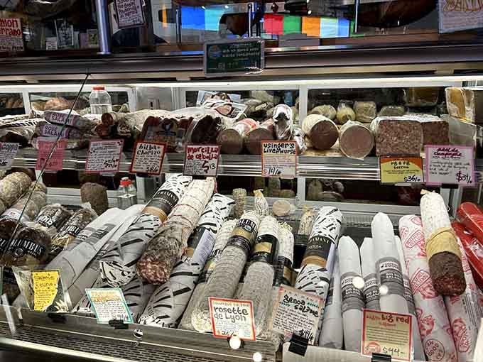 The deli counter showcases an impressive array of imported meats that would make any Italian grandmother proud.