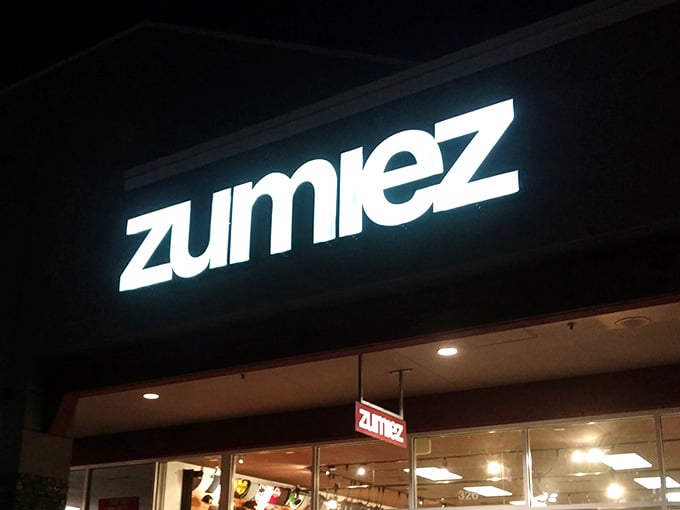 Zumiez glows invitingly after dark, because apparently some shopping emergencies can't wait until morning to be resolved.