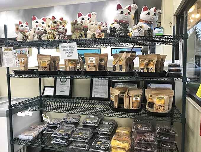 Beyond the plate lunches, a collection of lucky cats watches over homemade cookies and pies that make perfect desserts or edible souvenirs.