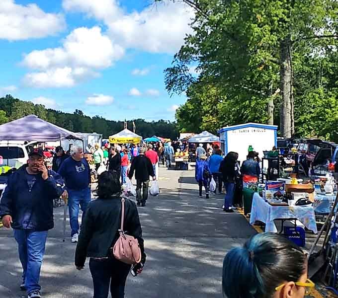 The market's pathways buzz with the energy of the hunt as shoppers clutch their finds, already planning where they'll display their treasures.