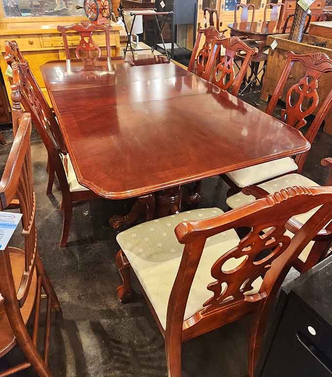 A dining table that's seen more interesting meals than your Instagram feed. Those chairs aren't just seating&mdash;they're an invitation to linger longer.