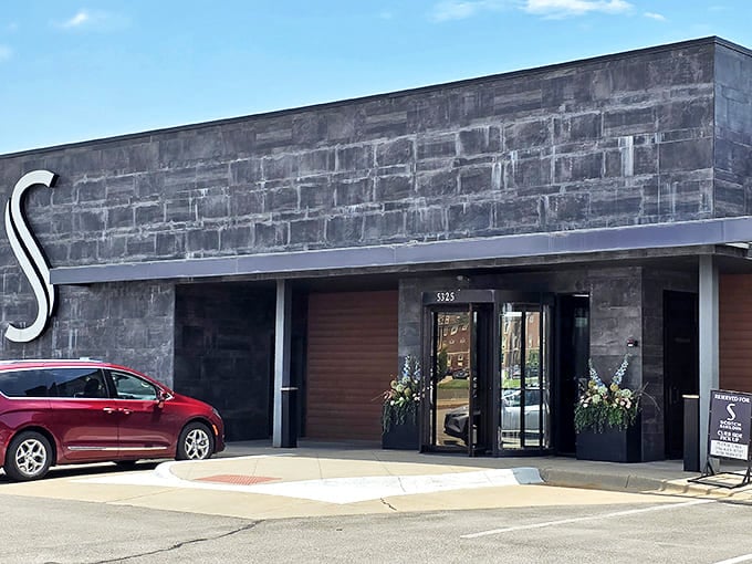 The entrance says "special occasion" without shouting it. Those planters aren't just decorative&mdash;they're the first hint of the attention to detail inside.