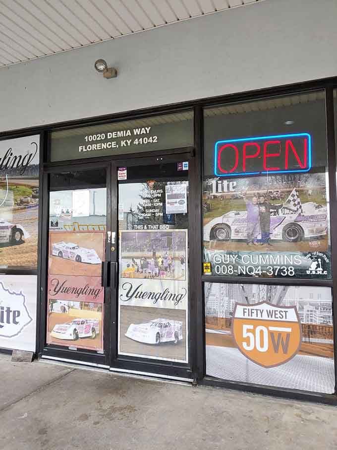 The entrance promises racing memorabilia and smoky delights. This door is basically a portal to your happiest food memories.