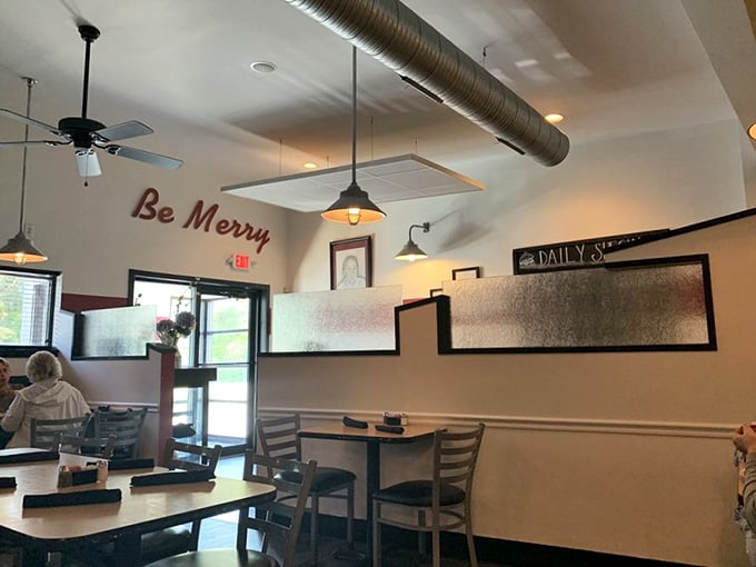 Be Merry isn't just wall decor&mdash;it's the unofficial motto of a space where pendant lights cast a glow that makes everyone look like they're in a food commercial.