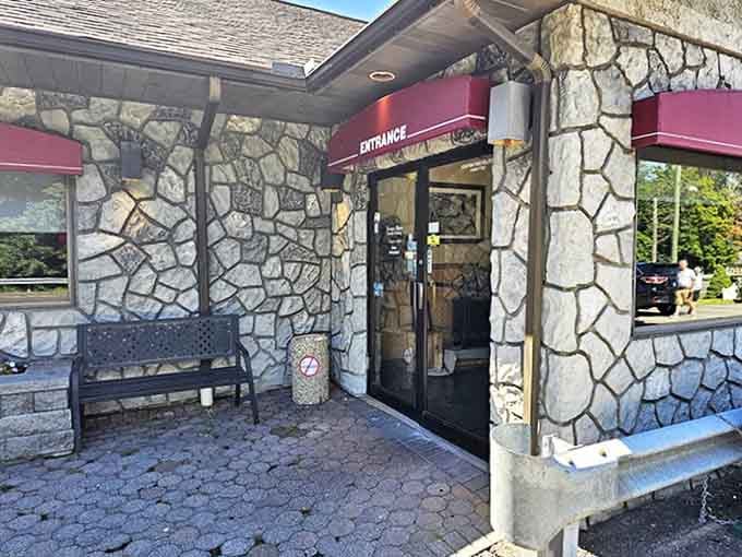 The entrance beckons with stone walls and burgundy awnings&mdash;a portal to comfort food nirvana nestled in Connecticut's charming landscape.