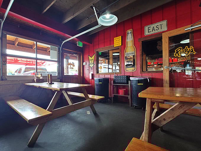 Inside these wooden walls, barbecue dreams come true. The red interior practically pulses with smoky promise.