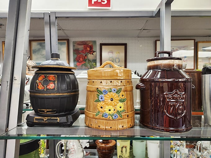 Cookie jar trio with personality to spare. That middle one looks like it's judging your snacking habits, and I respect that.