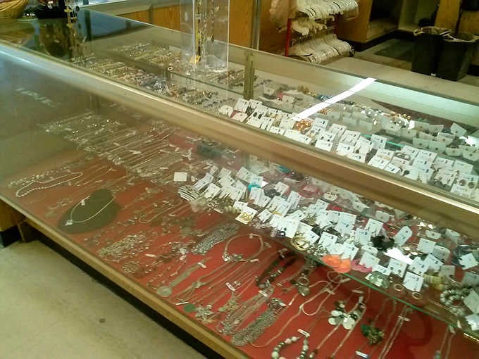 The jewelry counter: where costume glamour and forgotten treasures sparkle under glass, each with stories to tell.