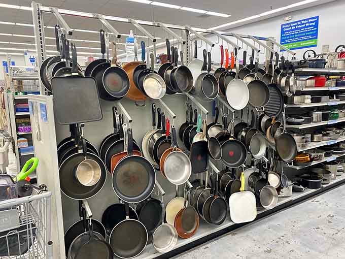 Pan-demonium! Kitchen essentials hanging like culinary medals of honor, ready to help create your next masterpiece without cooking your budget.