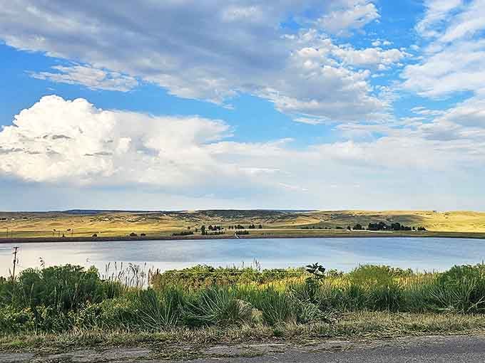 Water reflects sky in perfect symmetry&mdash;nature's mirror reminding us that beauty often comes in pairs.