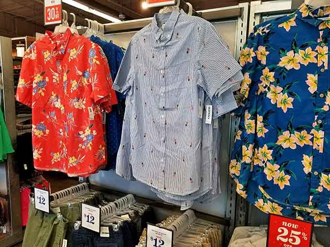 Hawaiian shirts and summer patterns create a vacation vibe regardless of season. The 25% off signs are just permission slips for your impulse purchases.