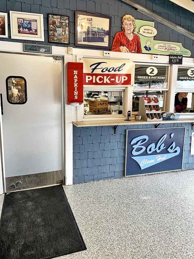 The ordering counter where seafood dreams come true. That "Food Pick-Up" sign might as well say "Happiness Collection Point."