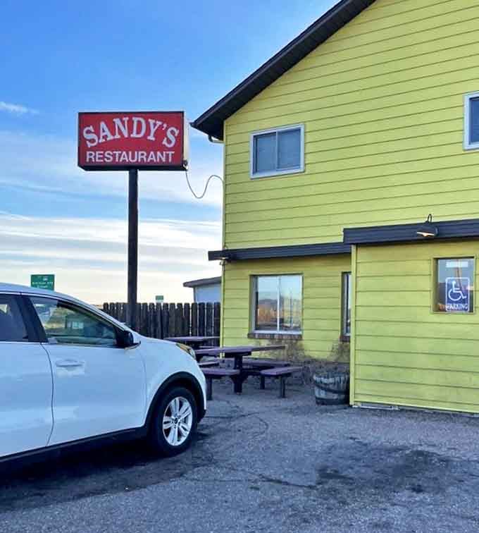 The exterior may have gotten a sunny yellow makeover, but that classic red sign remains unchanged&mdash;some traditions are sacred.