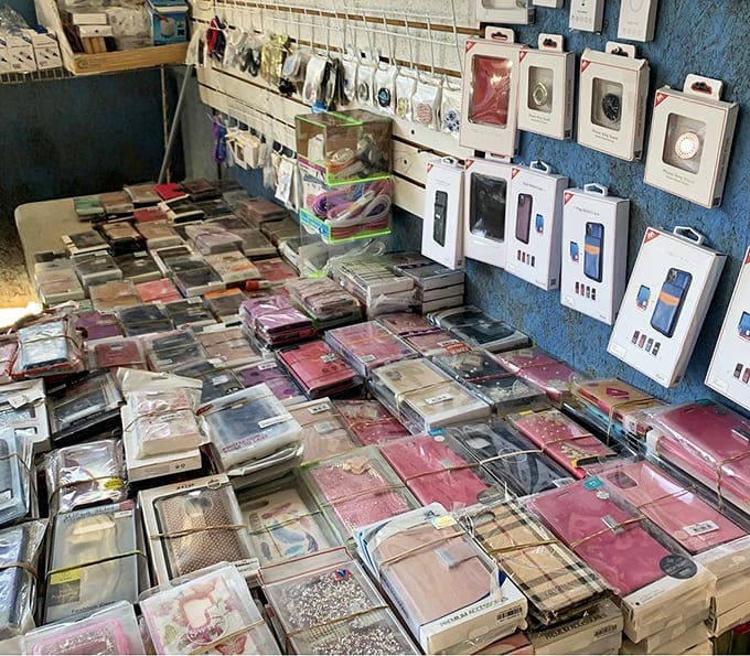 Phone case paradise where your digital sidekick gets dressed for less. Protection meets personality in plastic-wrapped packages.