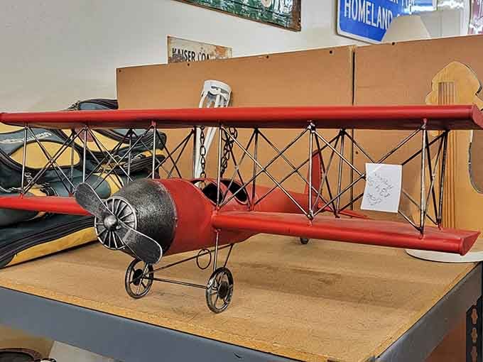 Red biplane model that captures the romance of early aviation. Perfect for the desk of anyone who dreams of barnstorming adventures.