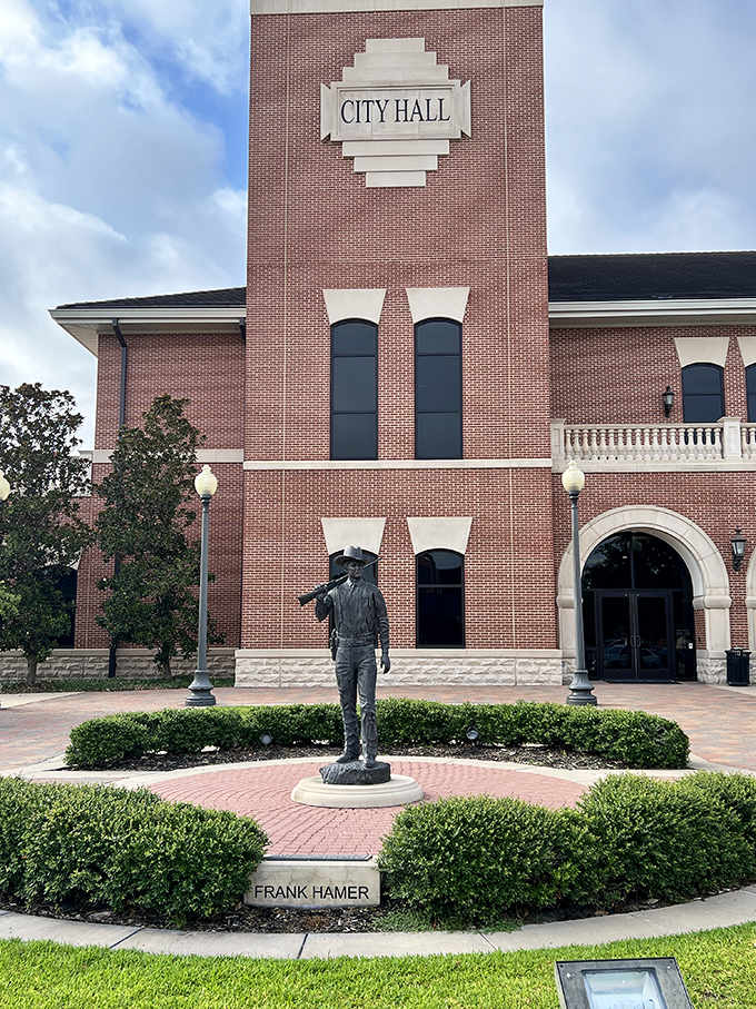 City Hall stands proud with its brick facade and commemorative statue, the architectural equivalent of a firm handshake welcoming you to town.