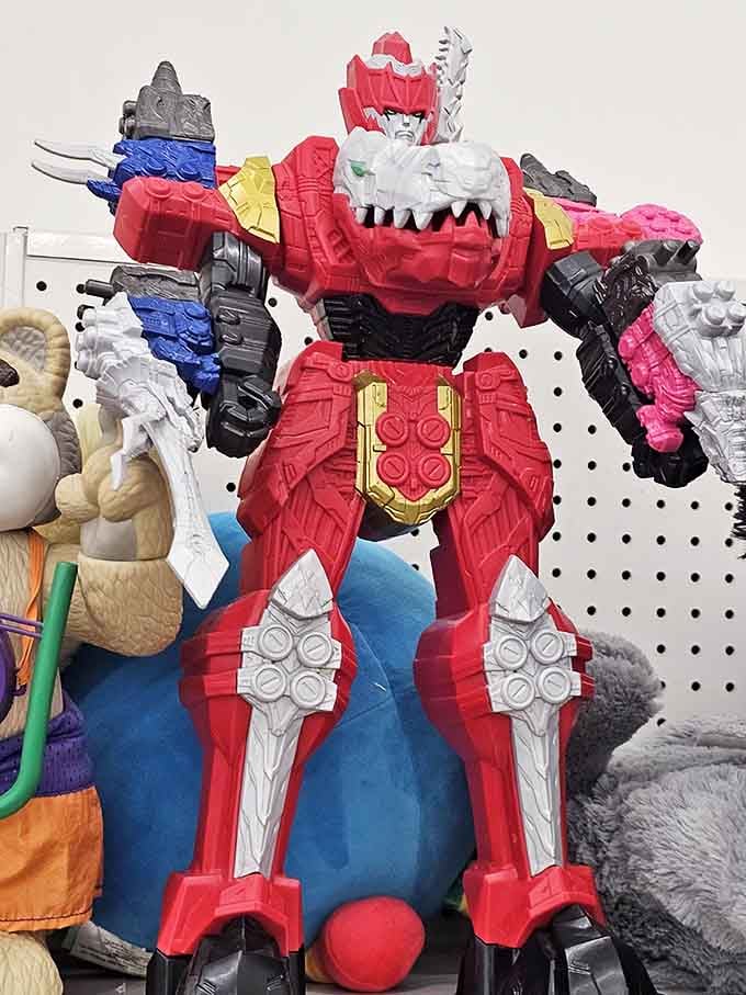 Action figures standing guard over the toy section. This Transformer has transformed from retail price to thrift store steal.
