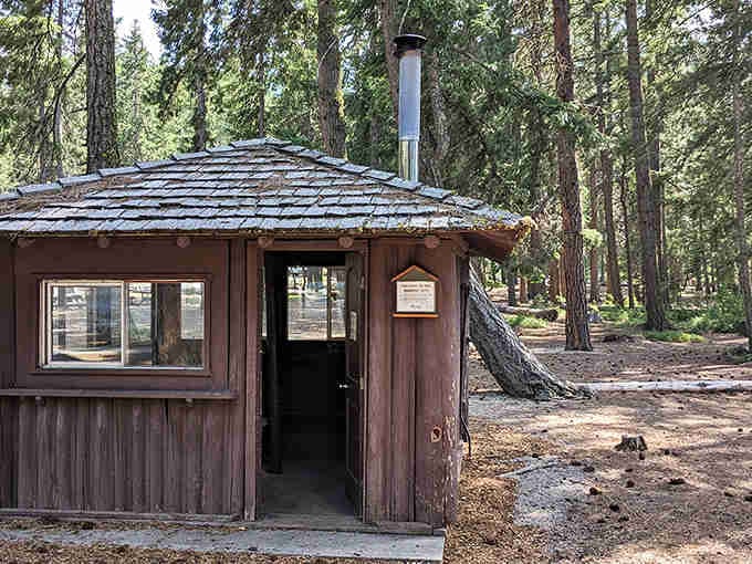 This rustic warming hut has witnessed more hot chocolate confessions and frozen toe revivals than a therapist's office during holiday family reunions.