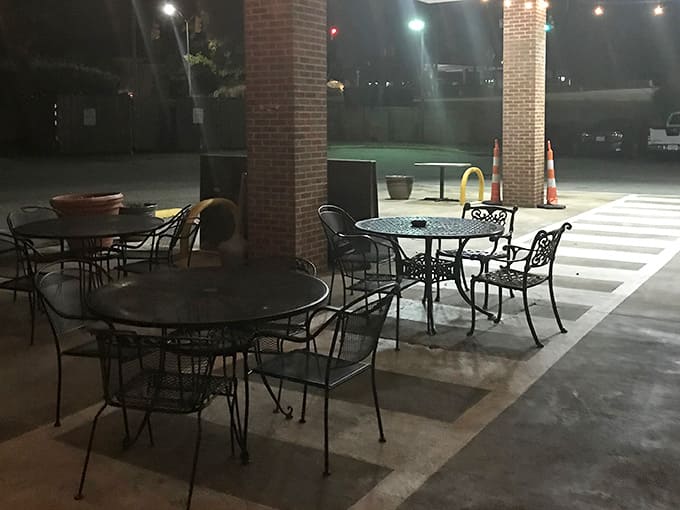 Evening patio seating under string lights offers the perfect spot for post-dinner conversation and relaxation.
