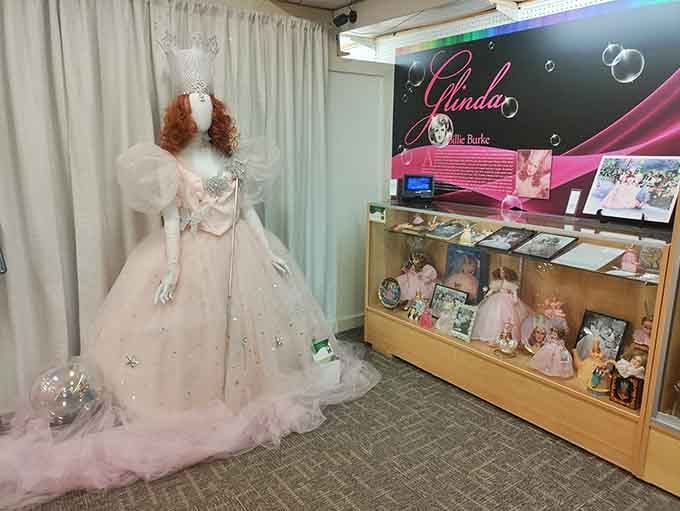 Glinda's ethereal gown floats like a cloud, proving good witches know how to make an entrance.