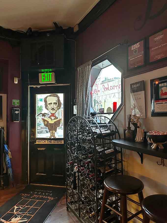 Even the wine rack embraces gothic elegance, storing bottles in wrought iron that looks plucked from Victorian Baltimore.