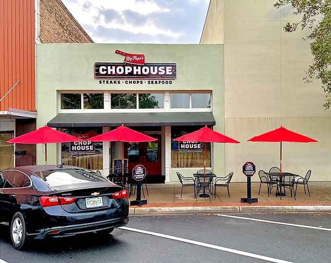 Big Papa's Chophouse brings steakhouse dining to downtown Quincy with outdoor seating and bright red umbrellas.