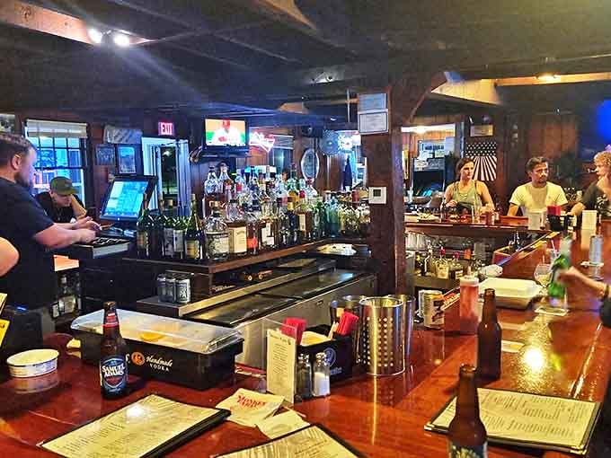 The bar area hums with the energy of locals and visitors united by one common goal: enjoying seriously good food and drink.