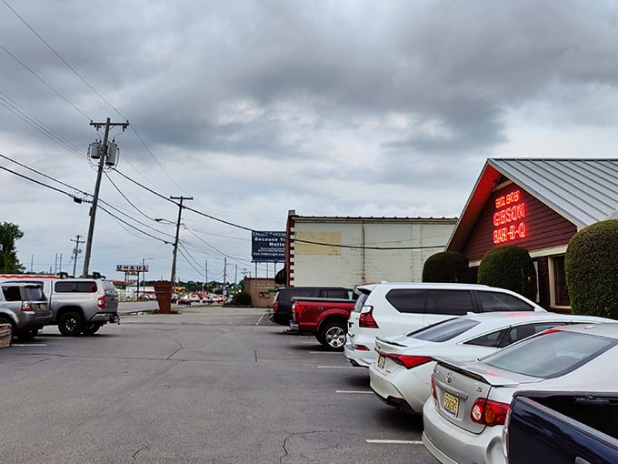 A full parking lot under gray skies means one thing: people will brave any weather for this barbecue.