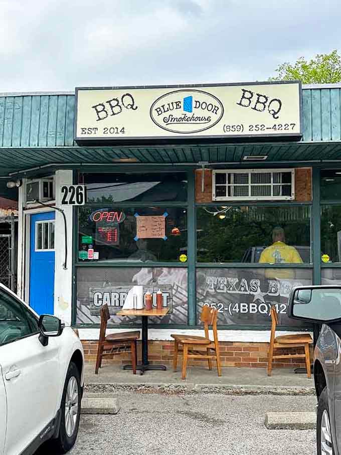Classic barbecue joint vibes with picnic tables out front, inviting you to stay awhile and savor slowly.