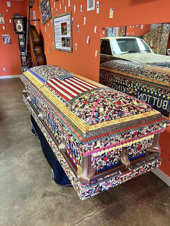 A button-covered coffin featuring an American flag design reminds us that this collection truly covers life's journey.