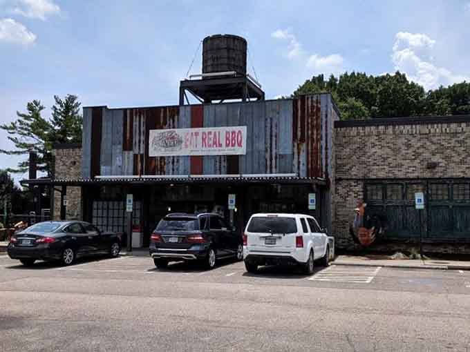 The parking lot view that promises good things ahead. That corrugated metal exterior hides some serious culinary treasures.