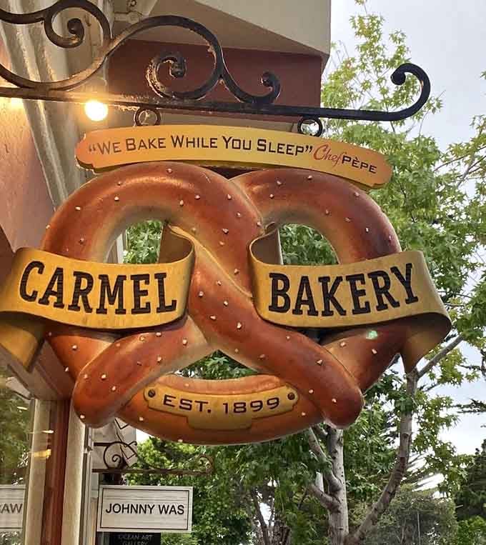 "We Bake While You Sleep" might be the most comforting promise ever made by a sign.