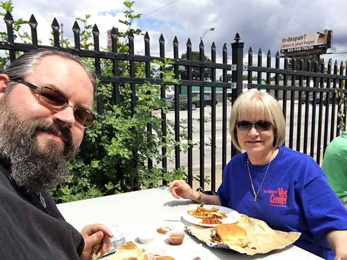 Happy diners enjoying their feast outdoors proves the pit beef pilgrimage is always worth every single mile traveled.
