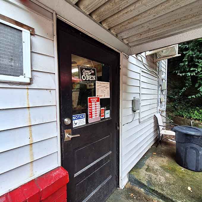 That "OPEN" sign is basically an invitation to happiness, one meal at a time.