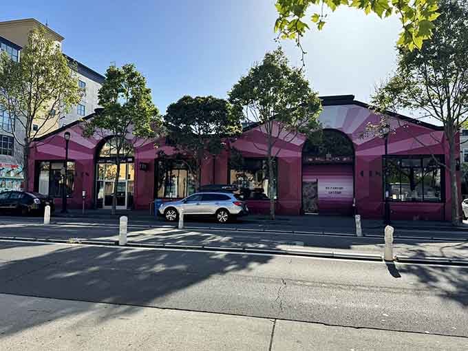 From across the street, Community Thrift's distinctive architecture and pink facade make it impossible to miss on Valencia Street.