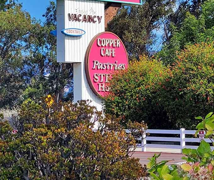 That vintage sign has been beckoning hungry travelers for years, and it never tells a lie about what's inside.