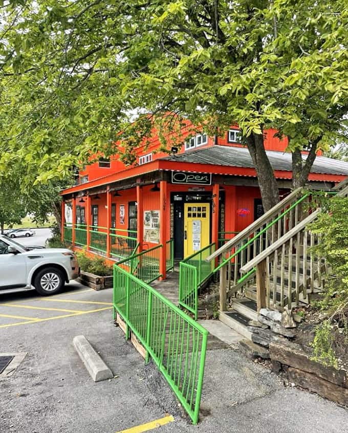 Bright green railings guide you toward orange walls and good times, like a tropical vacation without the airport.