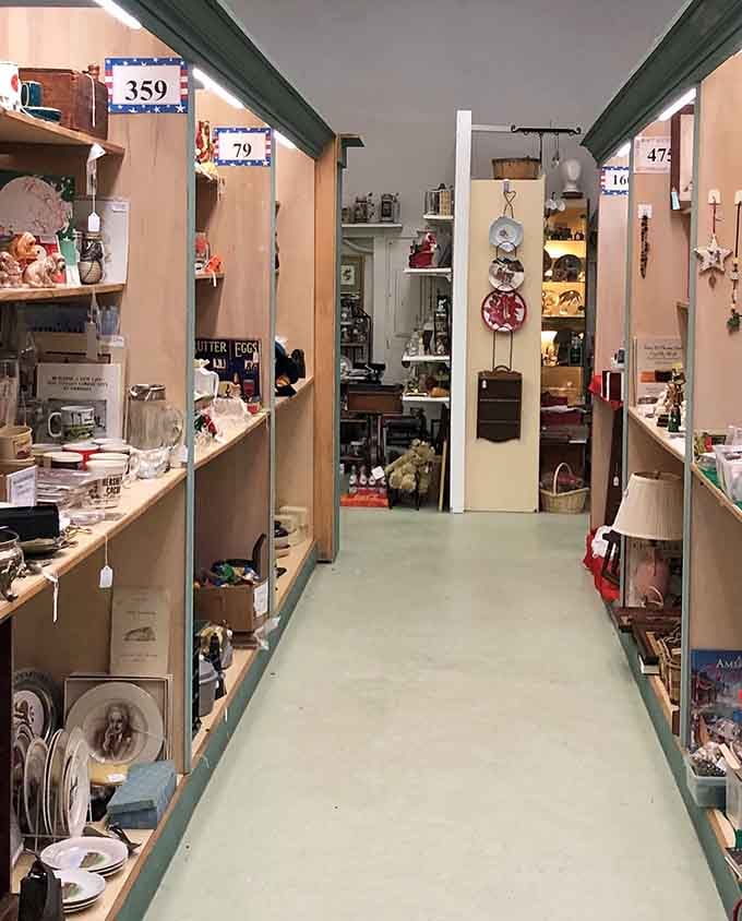 Numbered vendor booths stretch into infinity, each one a mini museum curated by someone's passion for preserving the past.